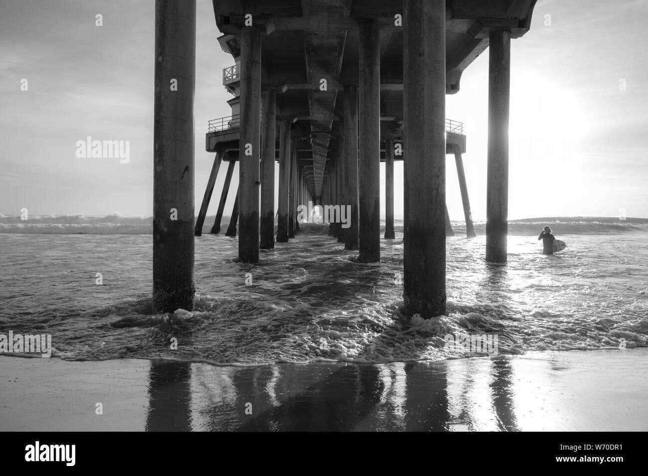 Tranquil beach pier sunset Black and White Stock Photos & Images - Alamy