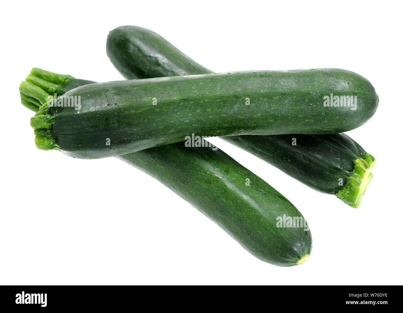 three ripe zucchini isolated on white background Stock Photo - Alamy