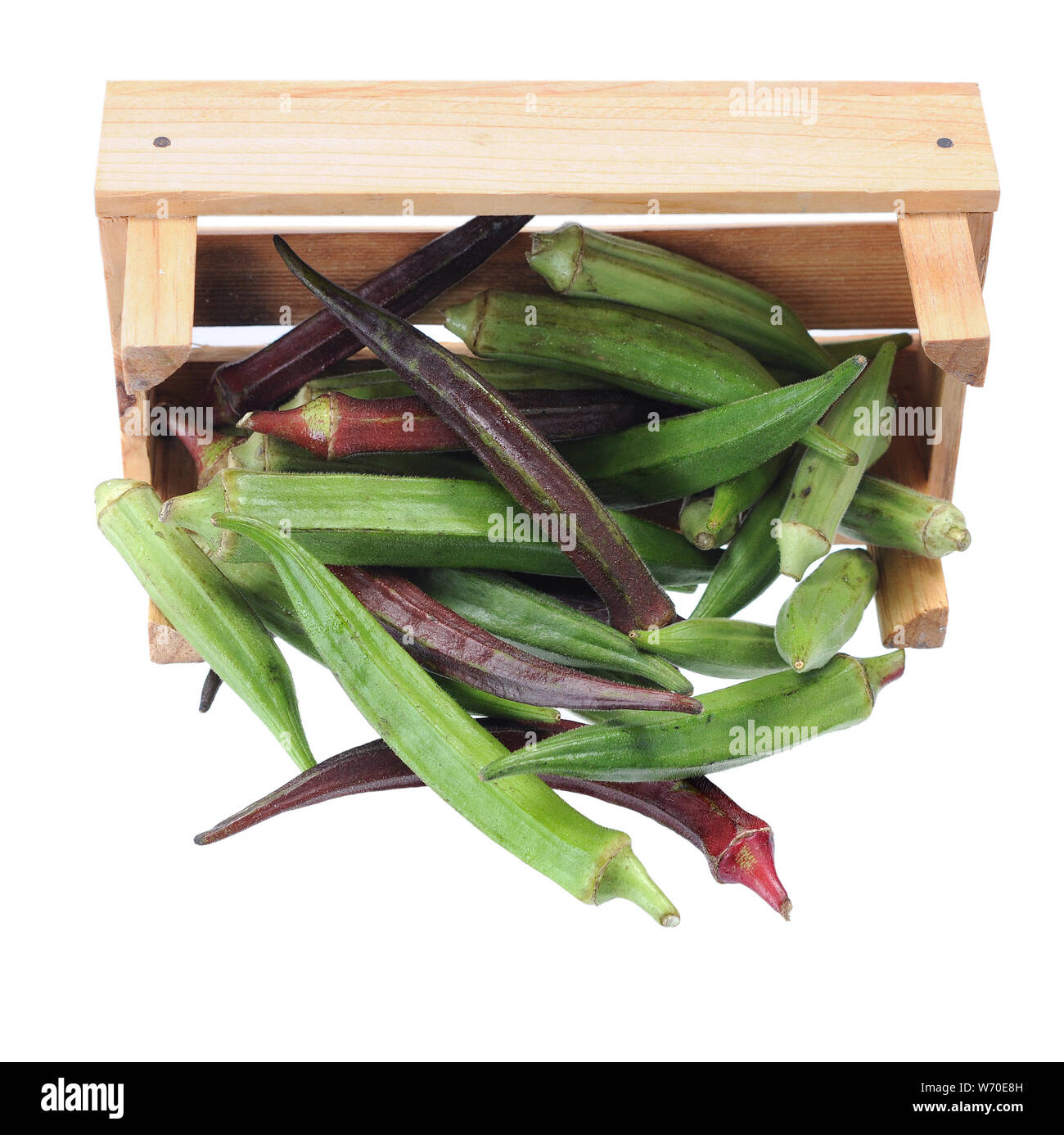 Okras on white background Stock Photo - Alamy