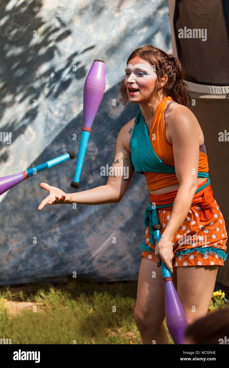 Sandy Springs, GA, USA - September 22, 2018: A female juggler tosses ...
