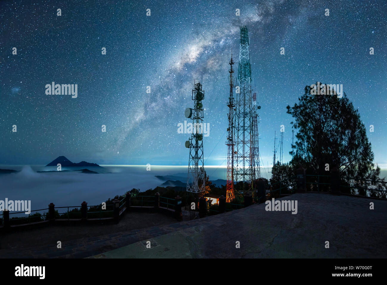 Mount Bromo covered with mist and milky way galaxy stars shining in the ...