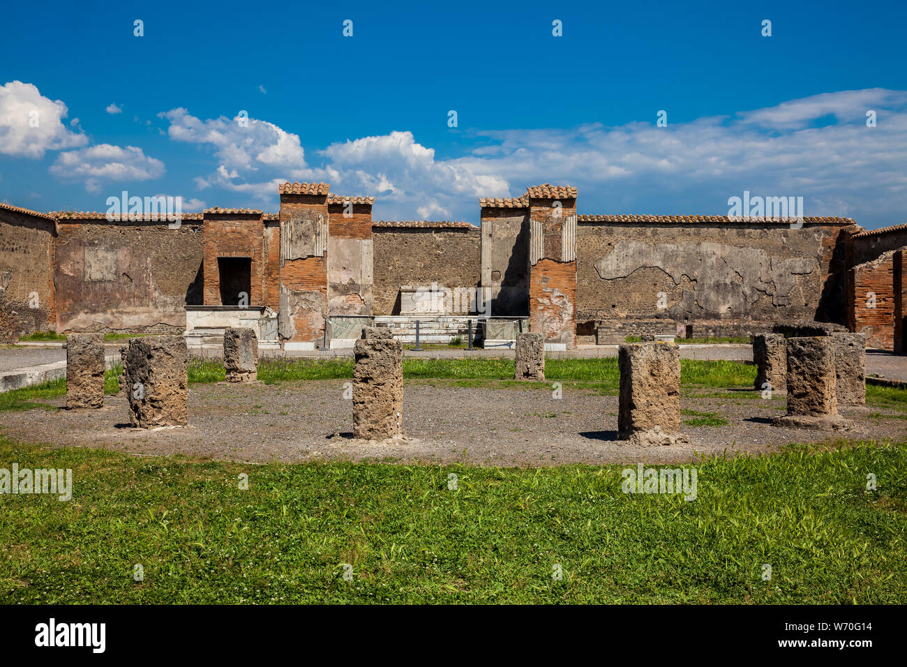 Ruins of the Macellum in the ancient city of Pompeii in a beautiful early spring day Stock Photo ...