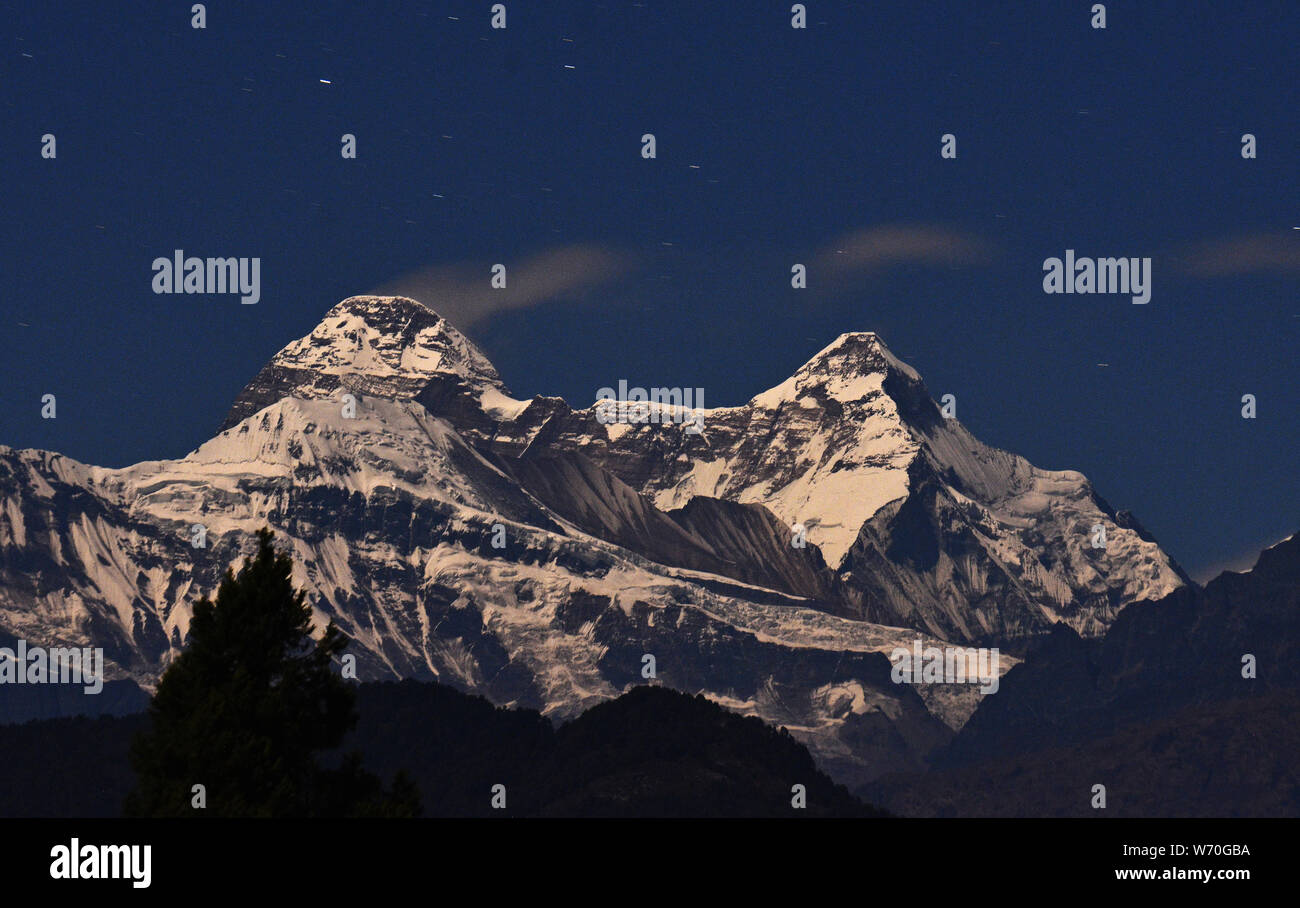 Nanda Devi peaks in Full Moonlight, Chaukori, Uttarakhand, India Stock ...
