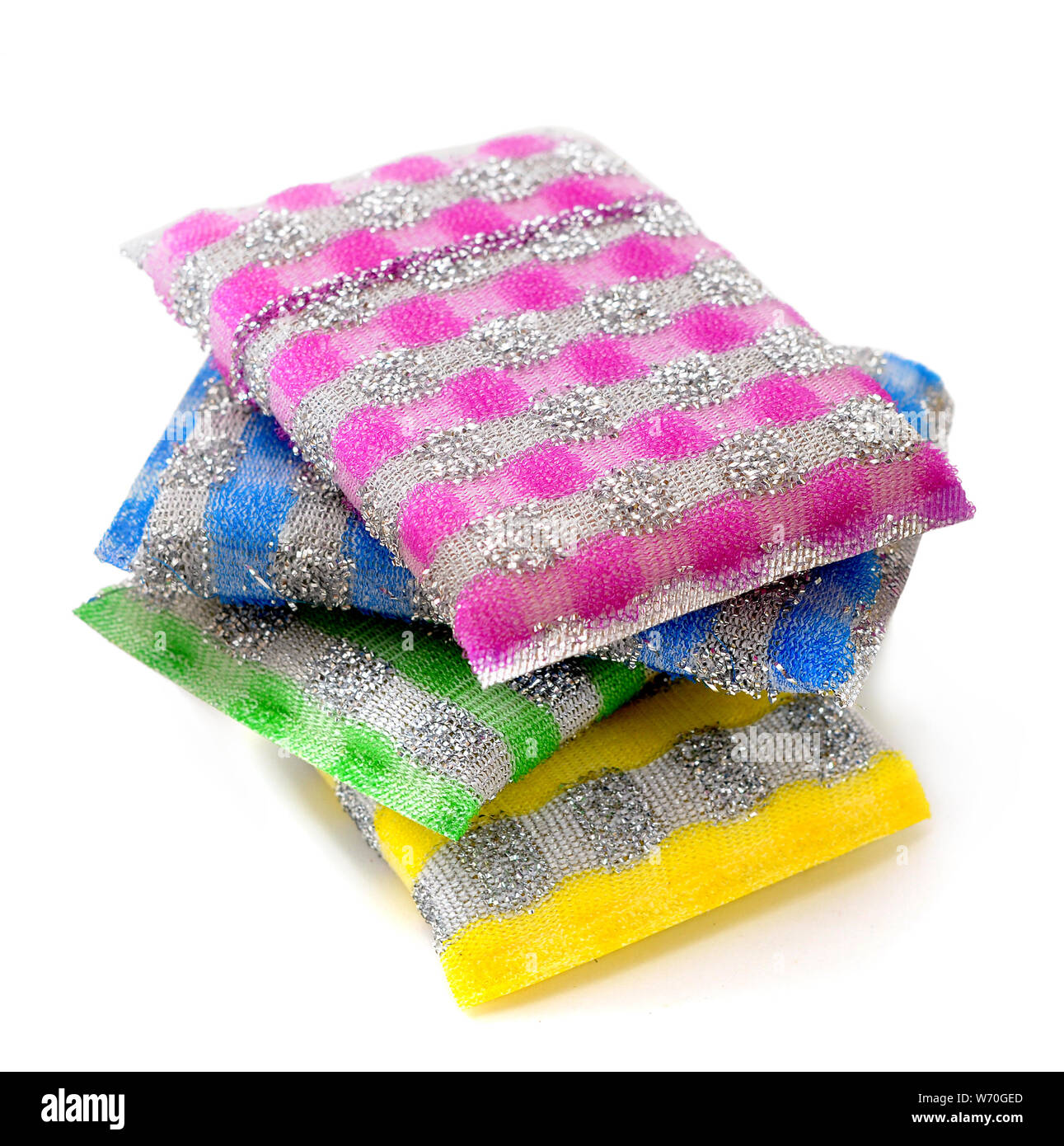 four scourings on white background Stock Photo - Alamy