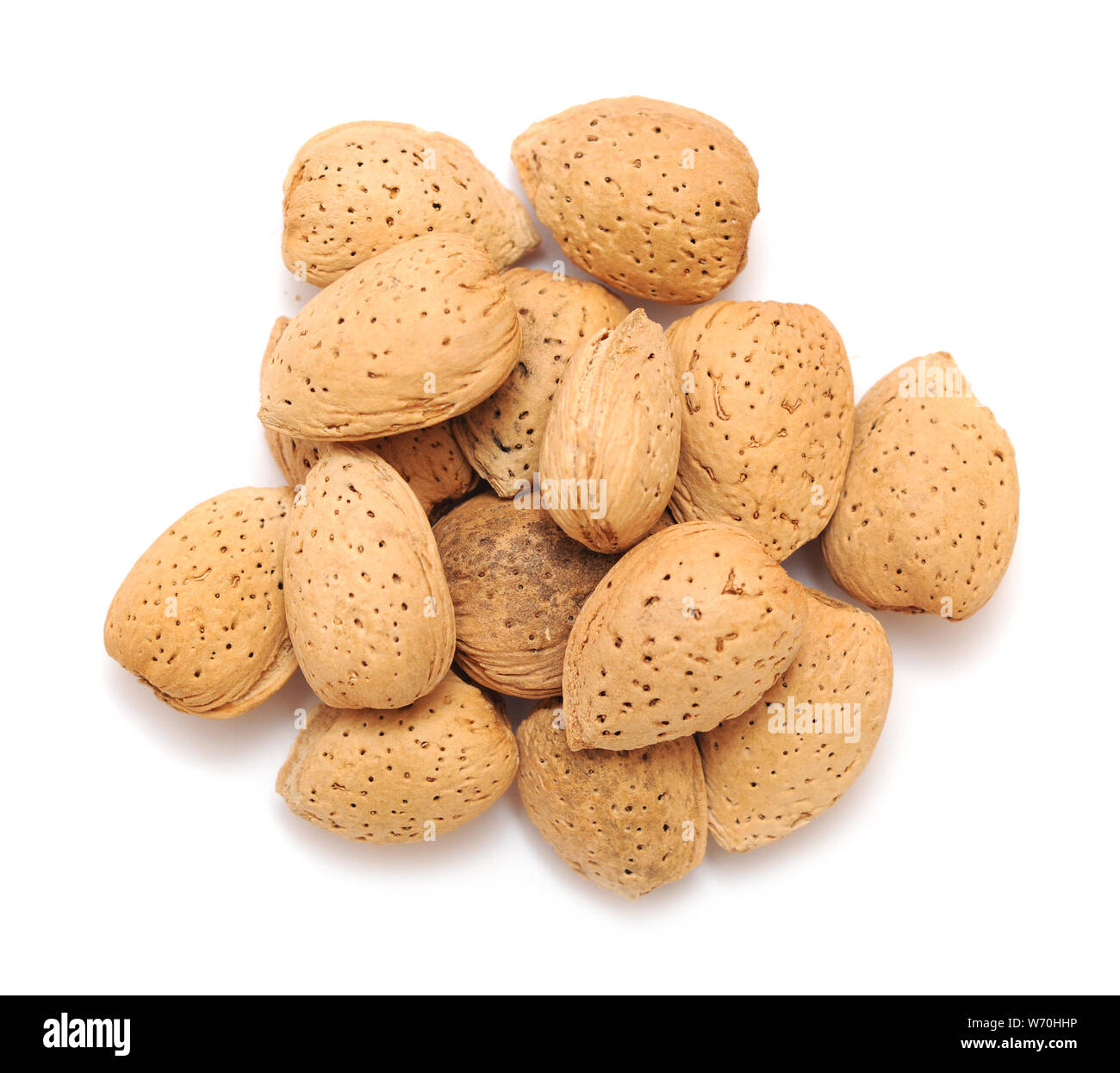 a lot of almond on white background Stock Photo - Alamy