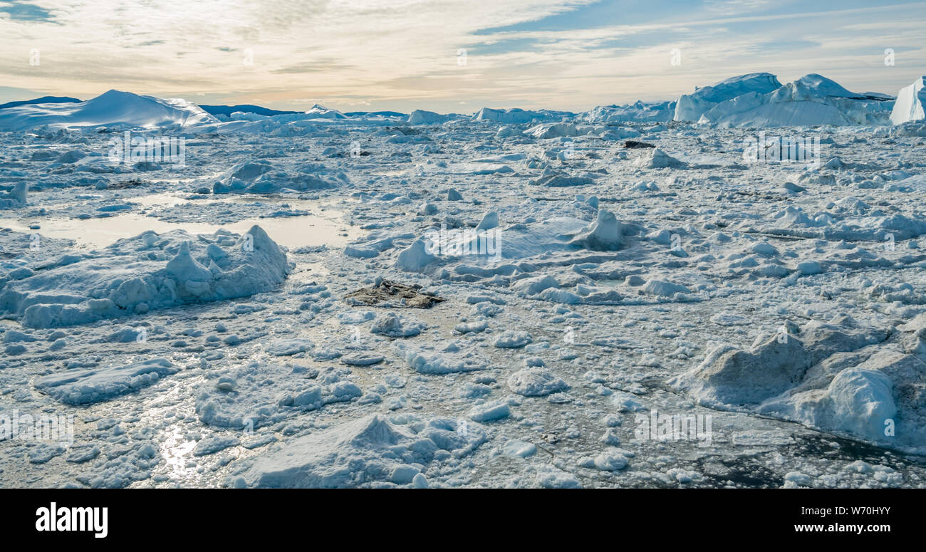Arctic nature landscape with icebergs in Greenland icefjord with ...
