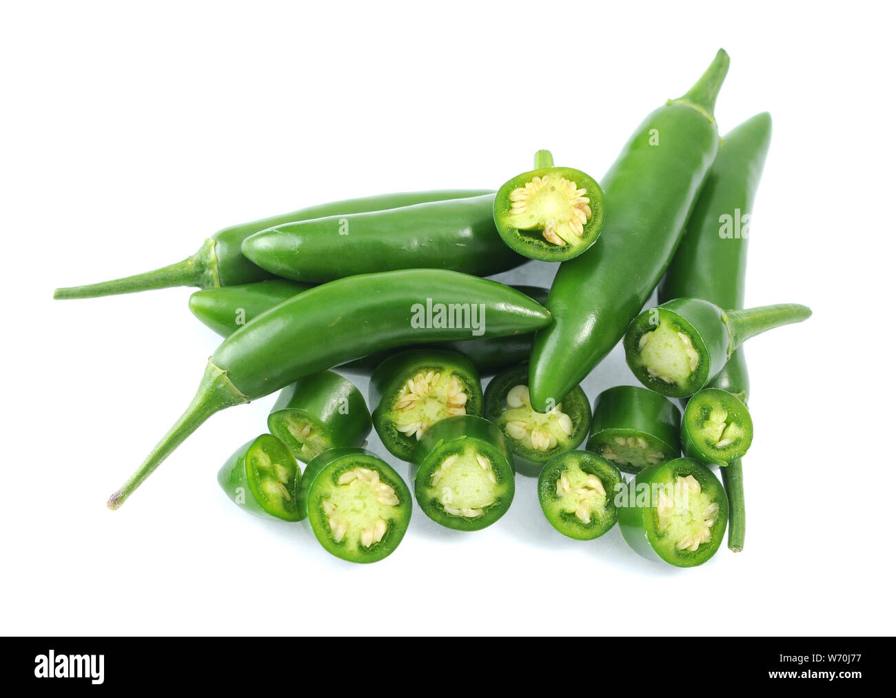 chopped and whole super serrano peppers isolated on white Stock Photo ...