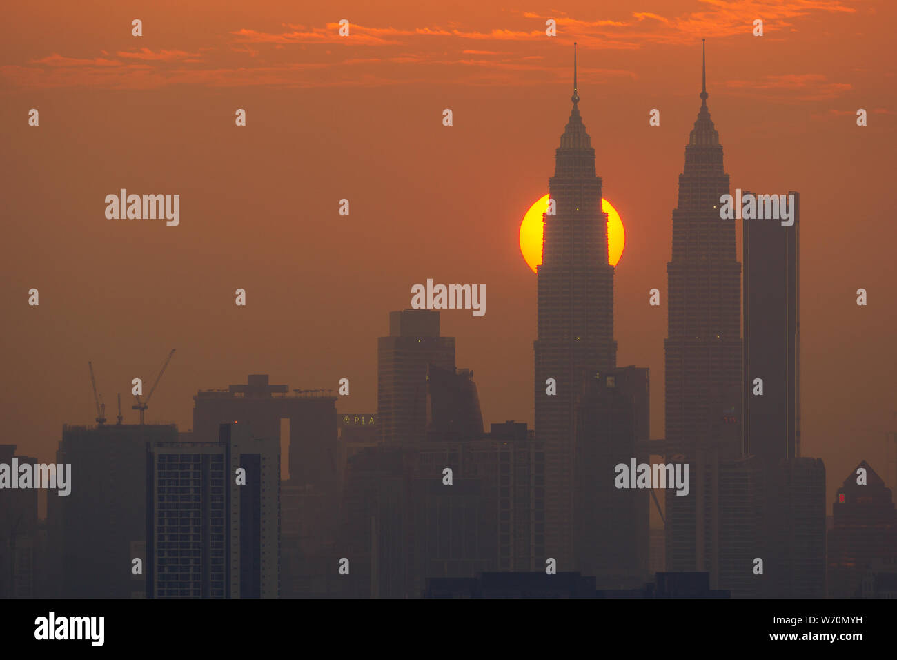 Cloudy haze sunset view over down town Kuala Lumpur, Malaysia Stock Photo - Alamy