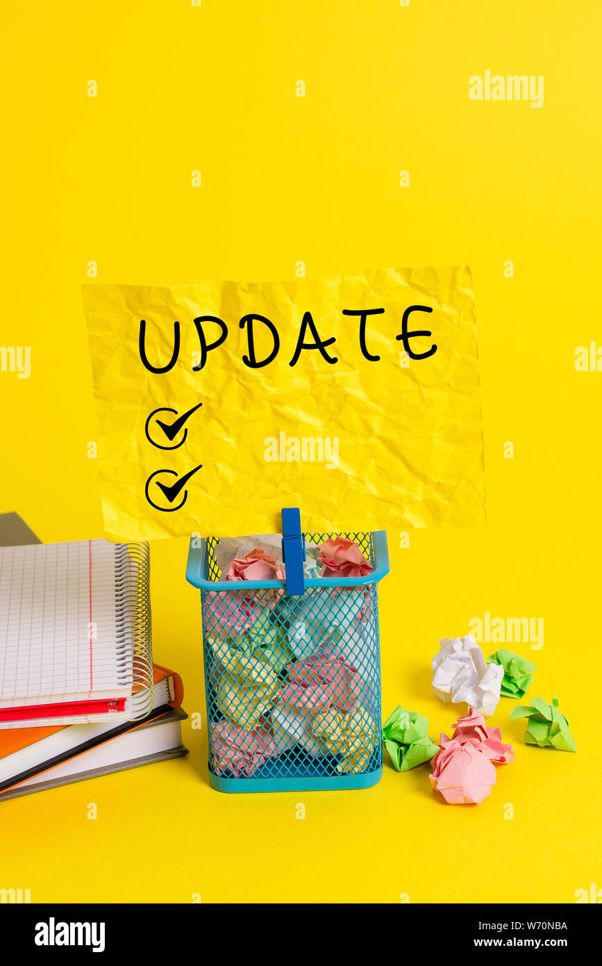 Conceptual hand writing showing UPDATE. Concept meaning make something ...