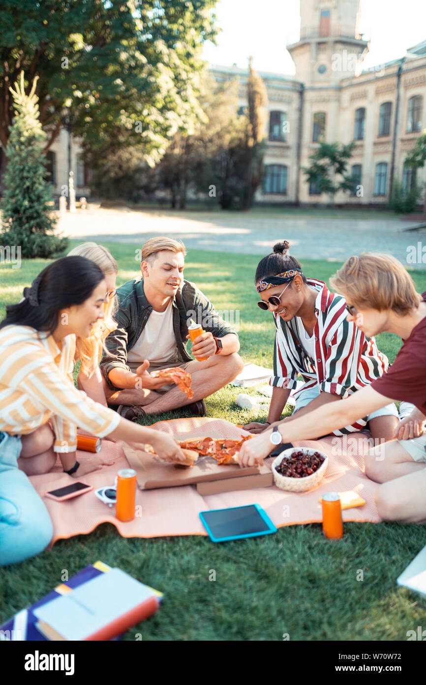 Friends discussing results of their exams and eating Stock Photo - Alamy