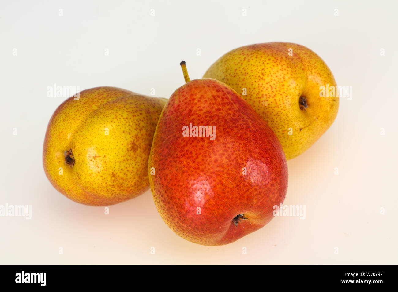 Sweet pear isolated on white background Stock Photo - Alamy