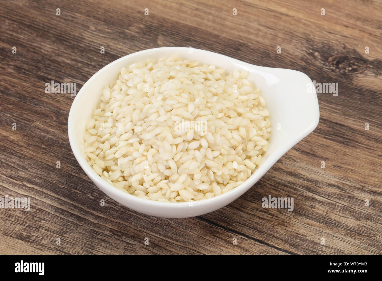 Raw Arborio rice for Italian risotto Stock Photo - Alamy