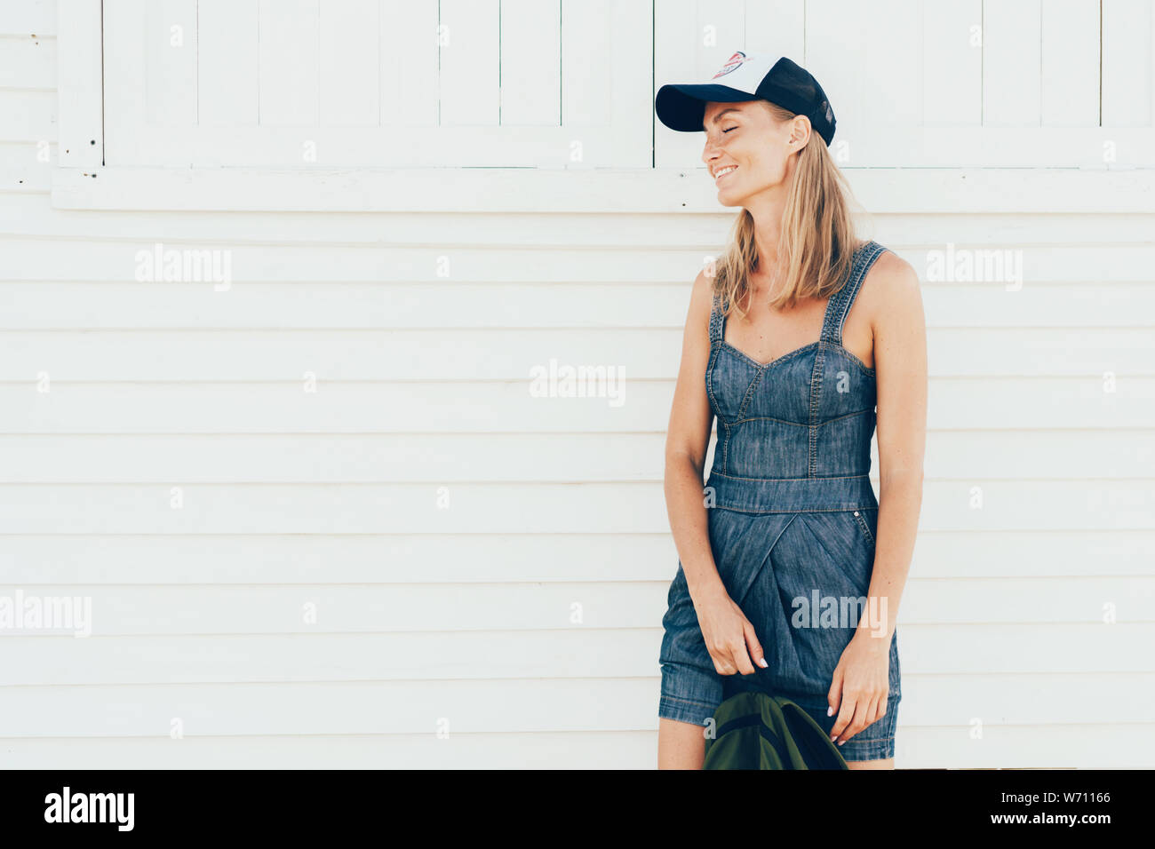 student in a short denim sundress Stock Photo - Alamy