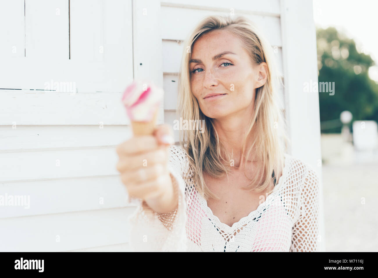 Girl eating melted ice cream hi-res stock photography and images - Alamy