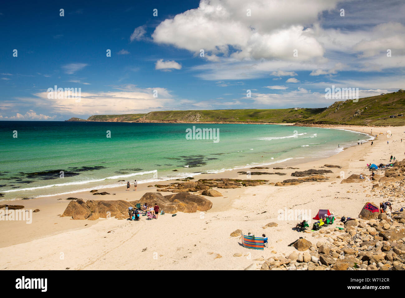 UK, England, Cornwall, Sennen Cove, holidaymakers on beach in sunshine ...