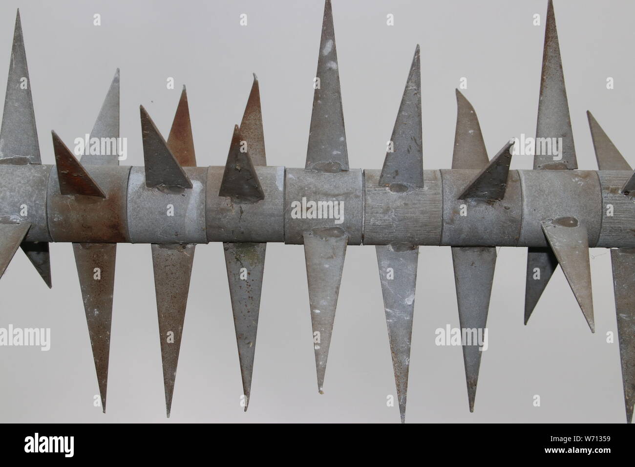 Security fence with rotating steel points to keep unwanted people out ...