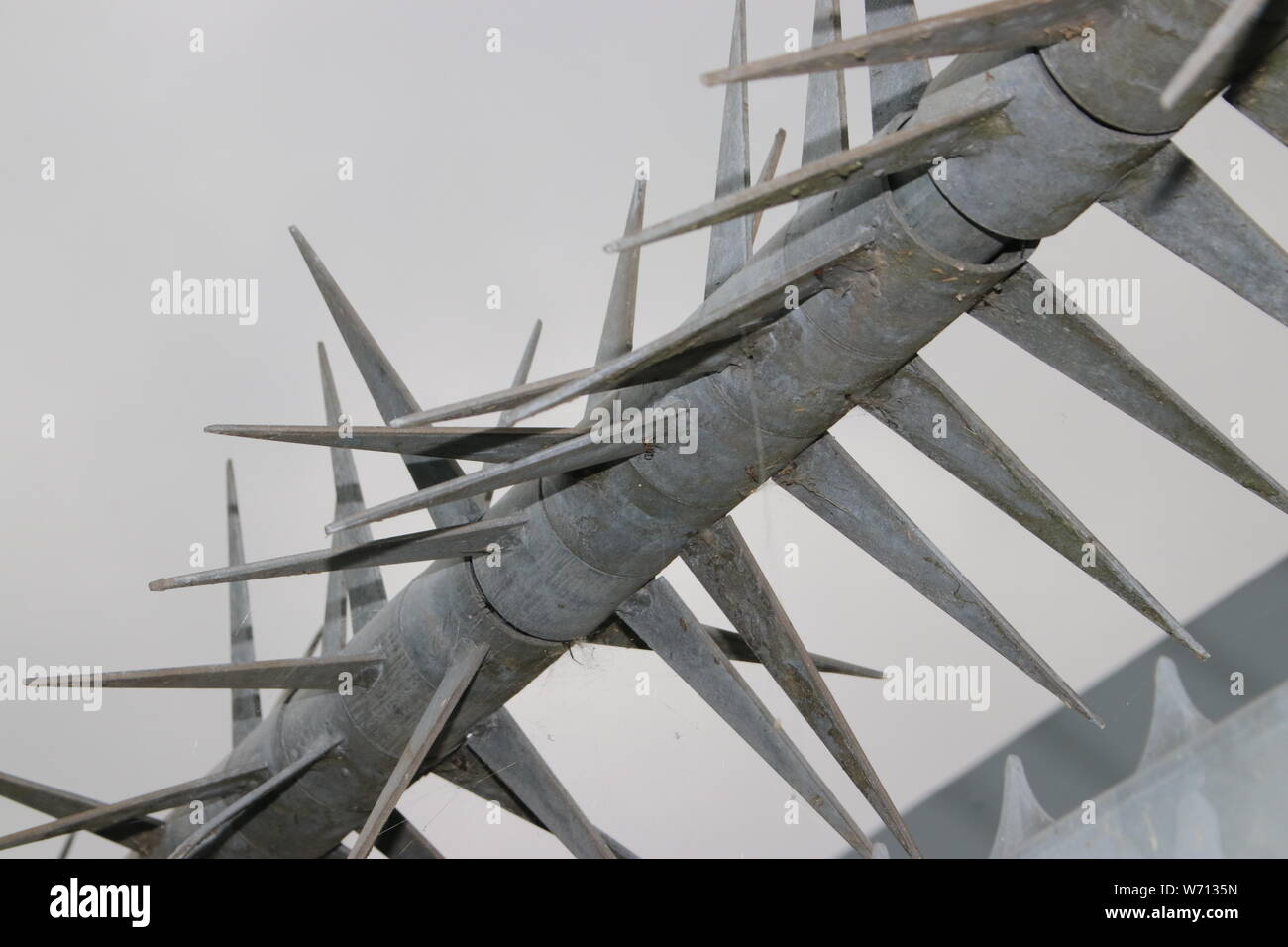 Security fence with rotating steel points to keep unwanted people out ...