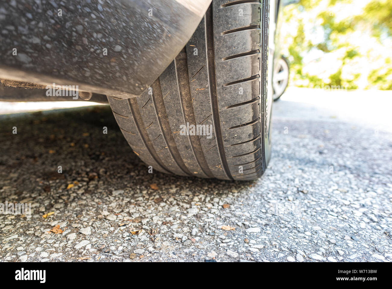 Car parking tyre hi-res stock photography and images - Alamy