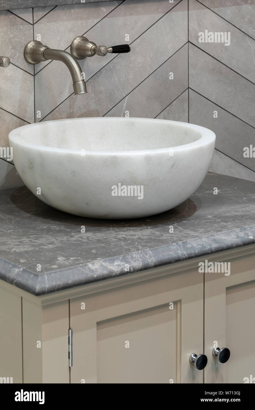 Mandarin Stone, modern marble circular sink Stock Photo - Alamy