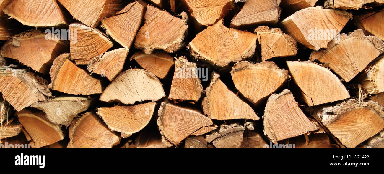 split dry firewood Stock Photo - Alamy