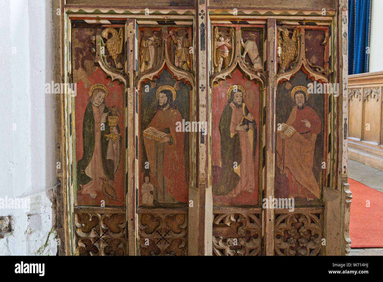 Historic painted screen, depicting the four evangelists, in the the ...