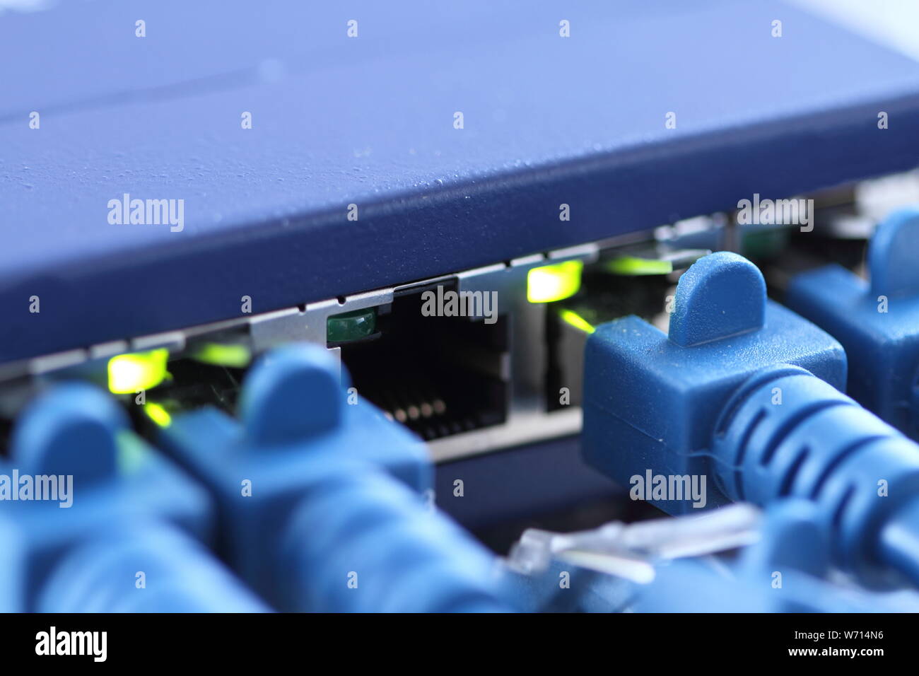 RJ45 plug in a router Stock Photo - Alamy