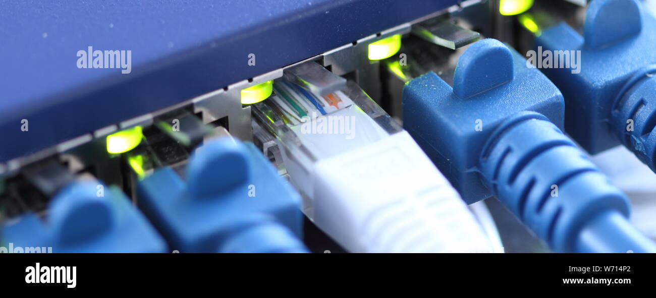 RJ45 plug in a router Stock Photo - Alamy