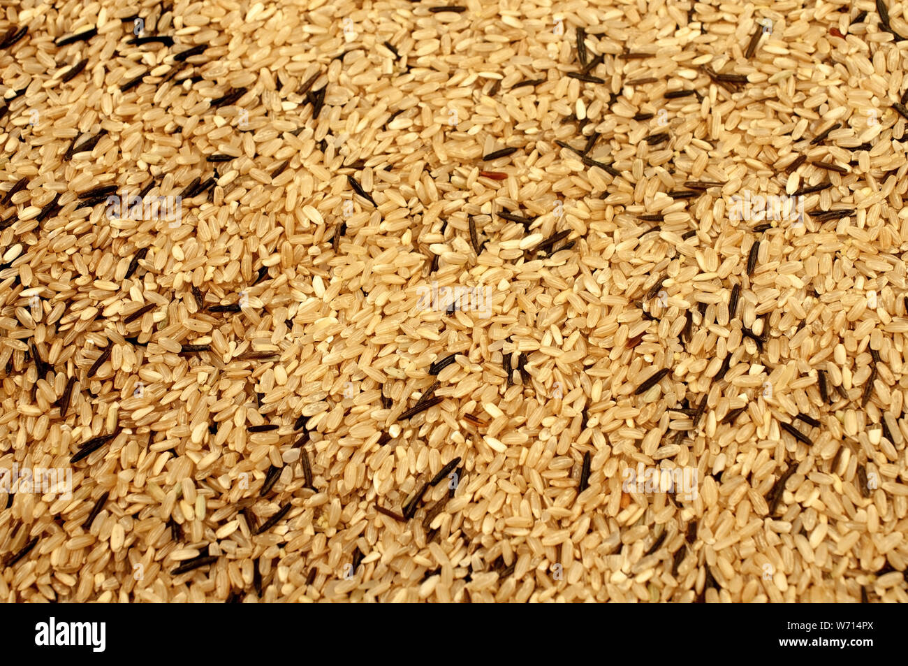 Texture of black and white rice. Solid background Stock Photo - Alamy