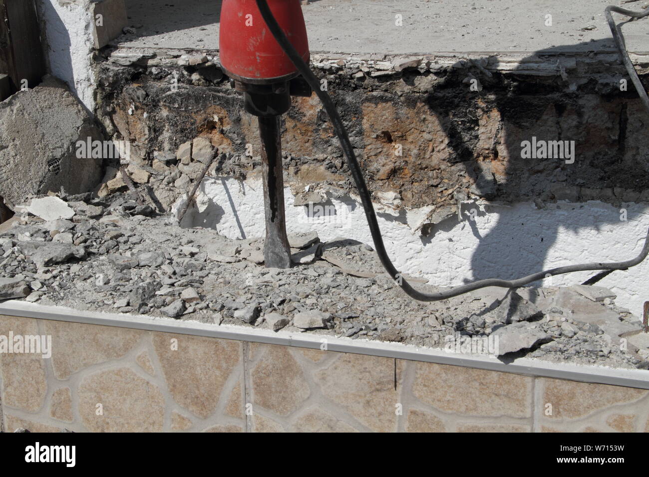 demolish an old staircase with a demolition hammer Stock Photo - Alamy