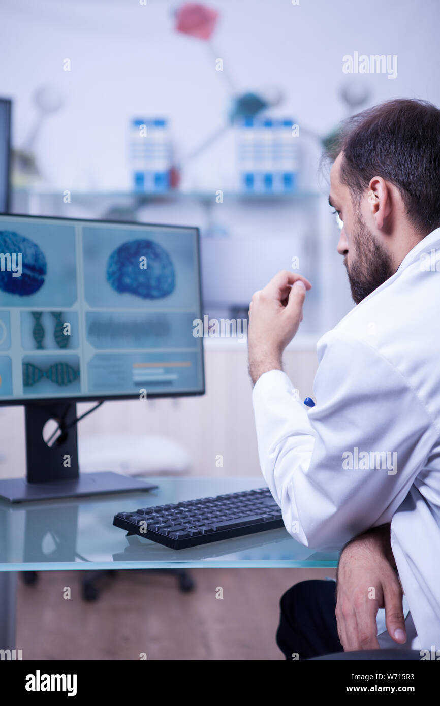 Ambitious doctor specialised in neurologic problems looking at the ...