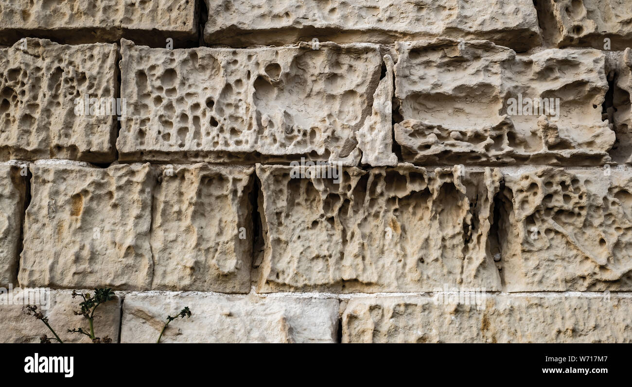 limestone bricks eroded and cracked in Malta, Manoel island Stock Photo ...