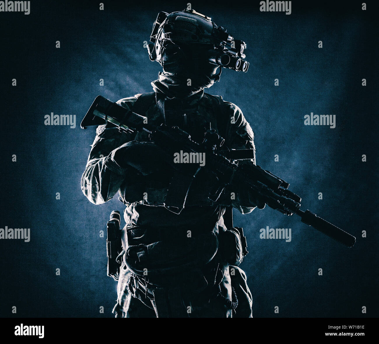 Commando with night vision goggles studio shoot Stock Photo - Alamy