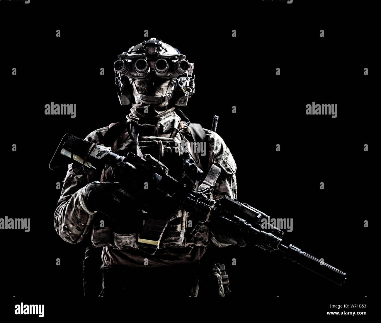 Army special forces shooter low key studio shoot Stock Photo - Alamy