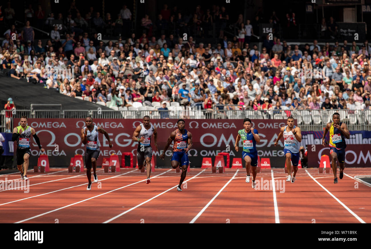LONDON, ENGLAND - JULY 20: Andrew Robertson (GBR) Akani Simbine (RSA ...