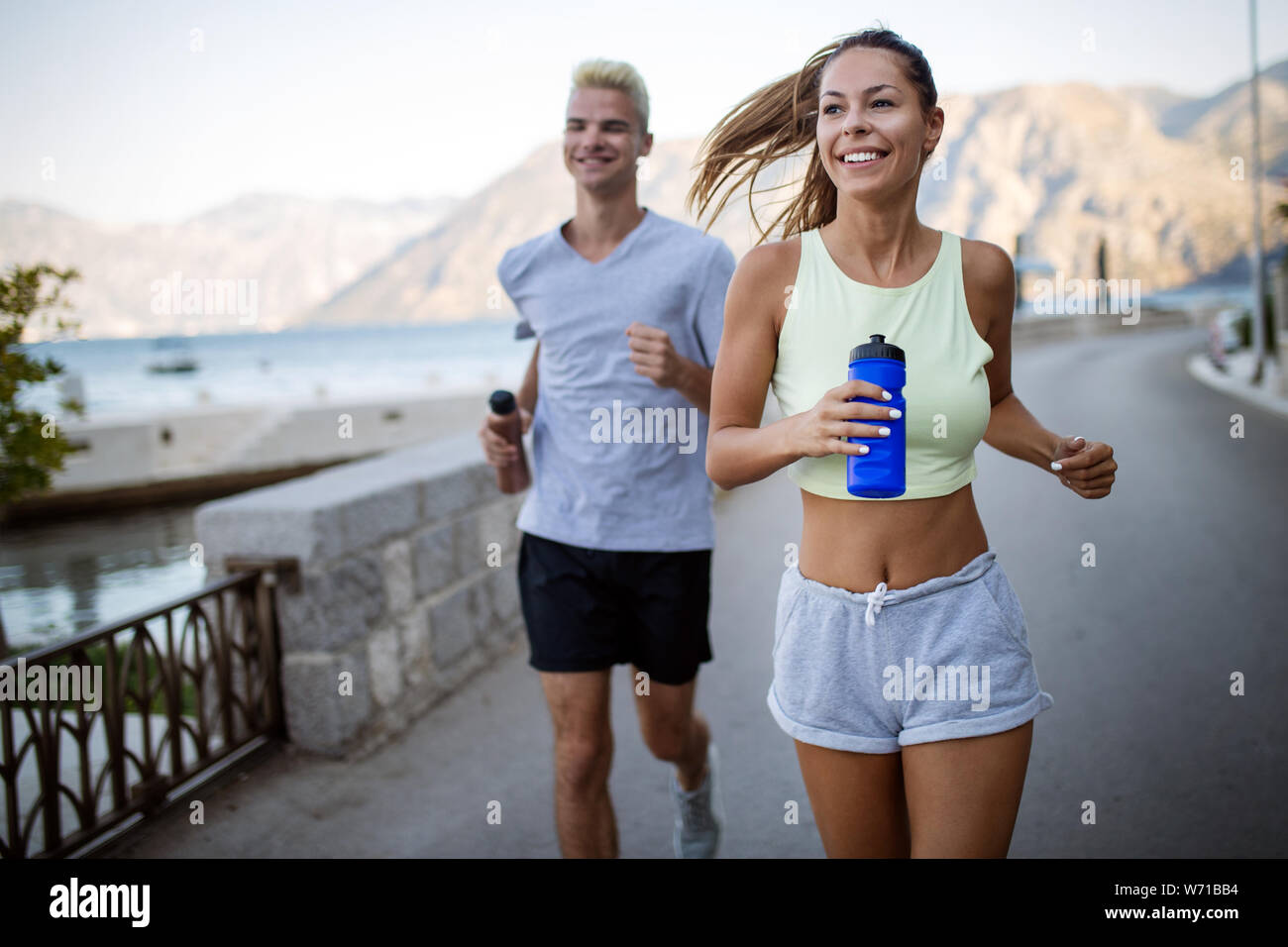 Healthy sporty lifestyle. Happy fit people friends exercising and ...