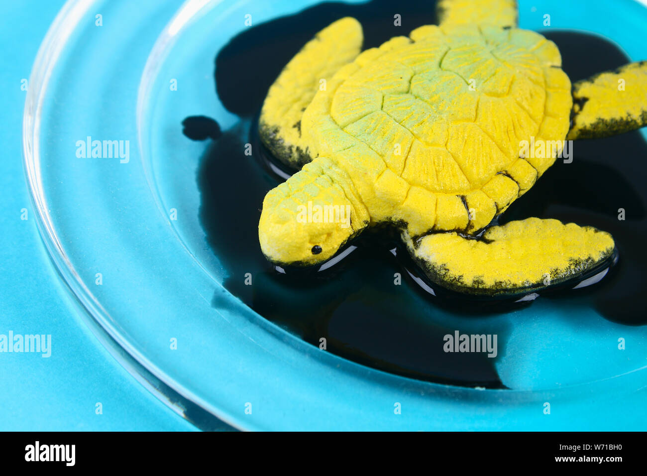 Turtle in oil. pollution in ocean environmental problem. Ecological ...