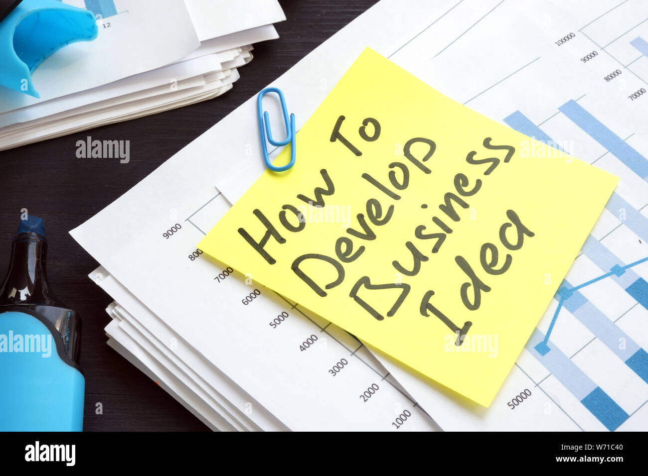 How to develop business idea plan on a desk Stock Photo - Alamy