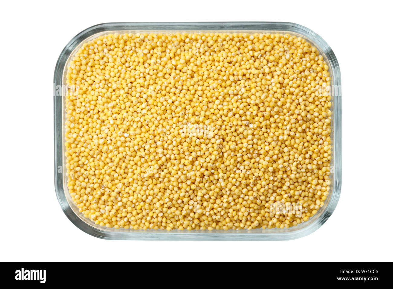 raw millet cereal in a plate on a white background, isolated Stock ...