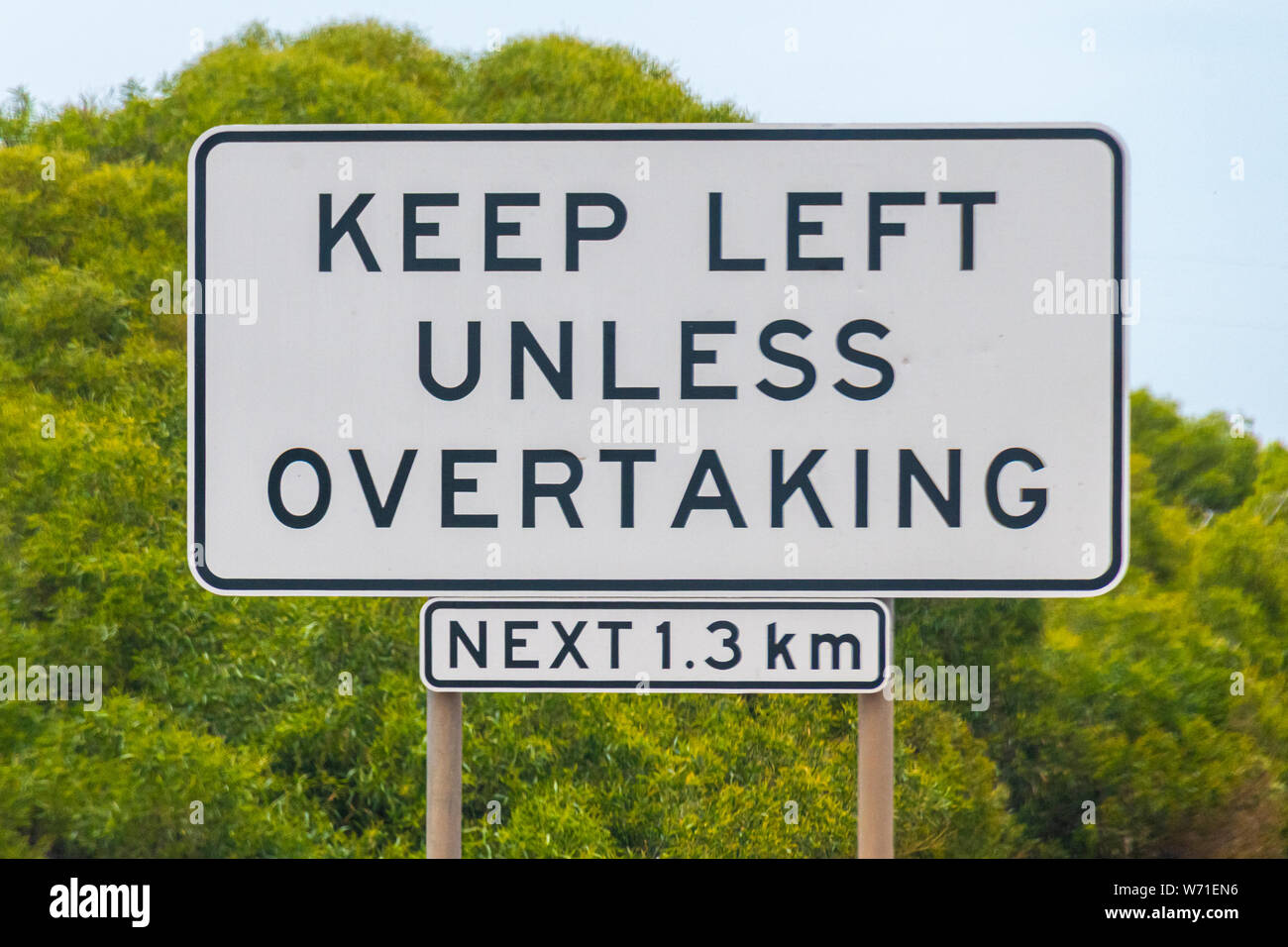 Keep left unless overtaking street sign in Australian bush Stock Photo ...