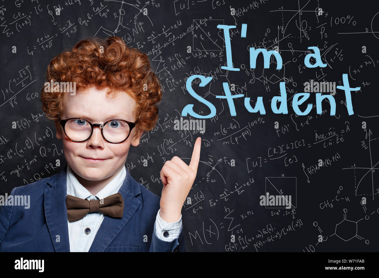 Back to school concept with smart kid student on chalkboard with ...