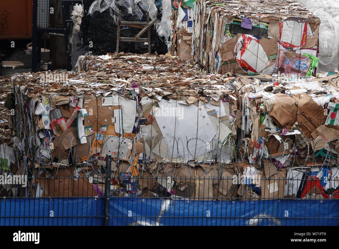 Berlin, Germany. 30th July, 2019. Compressed waste paper stacked in ...