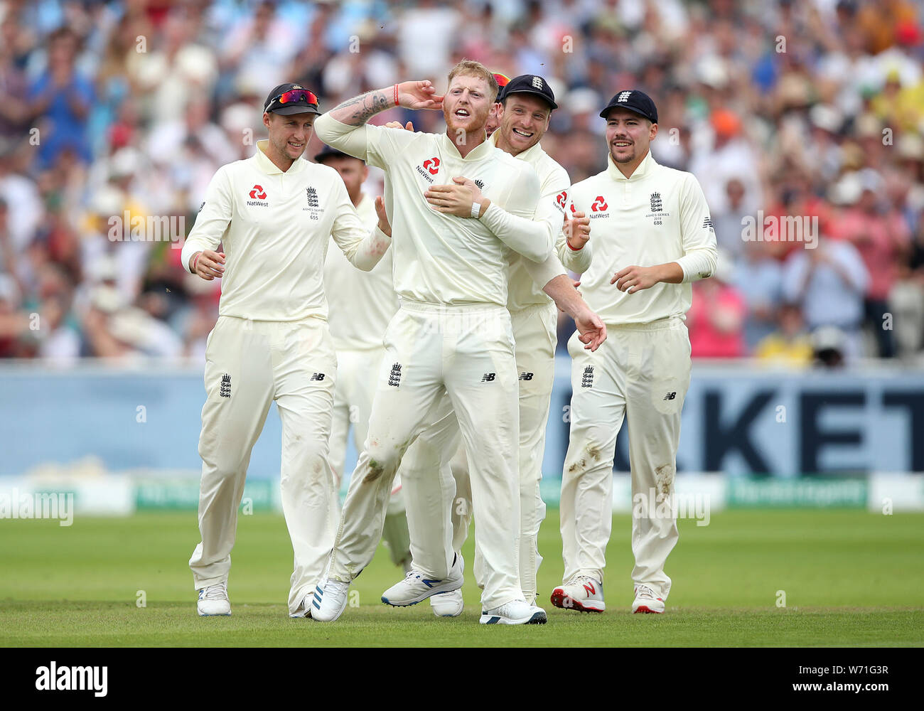 England's Ben Stokes celebrates taking the wicket of Australia's Travis ...