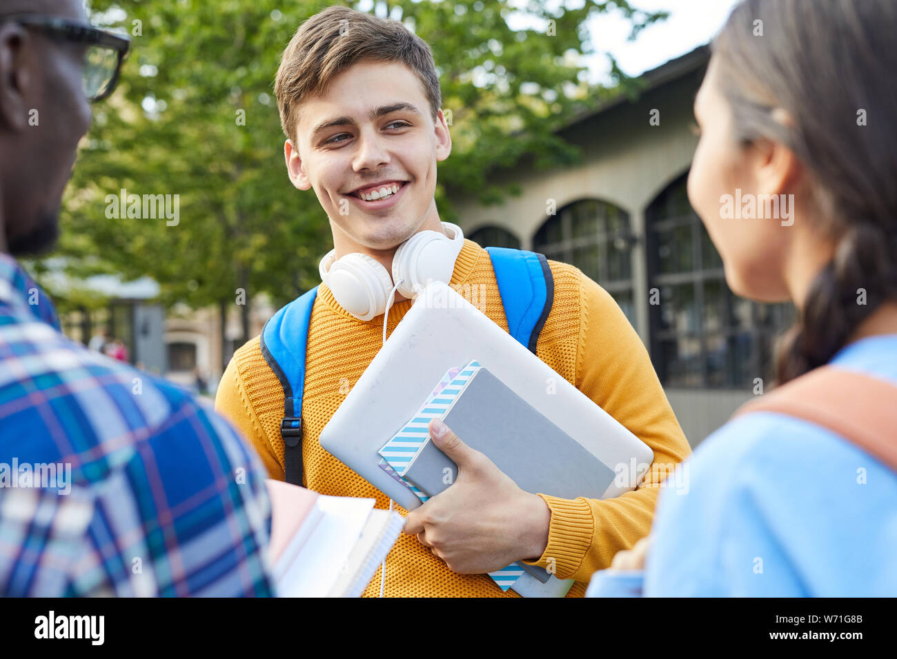 Three College Friends Talking High Resolution Stock Photography and ...