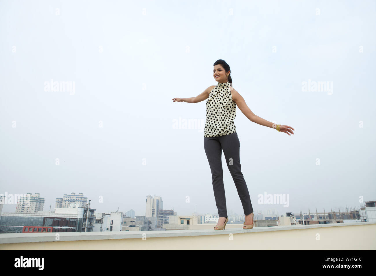 Professional indian woman walking hi-res stock photography and images ...