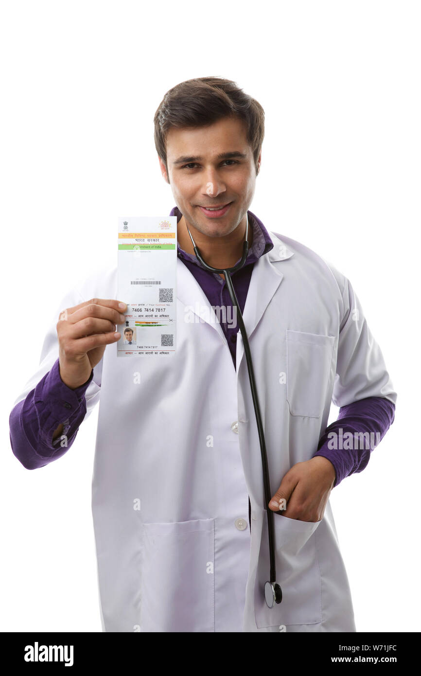Female doctor showing an Aadhar card Stock Photo - Alamy