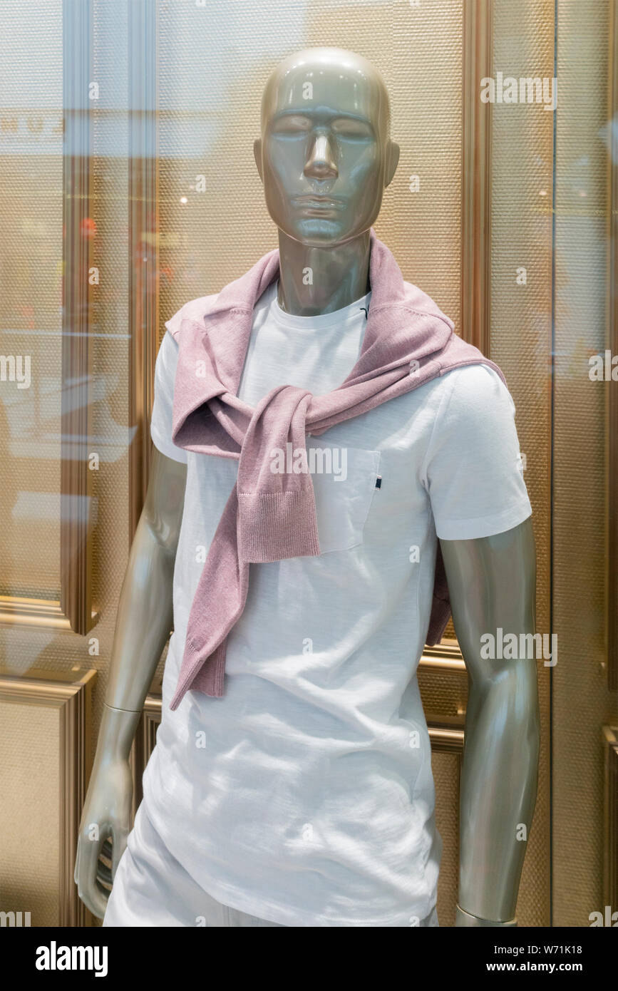 Mannequin in a shop window of men's clothing Stock Photo - Alamy
