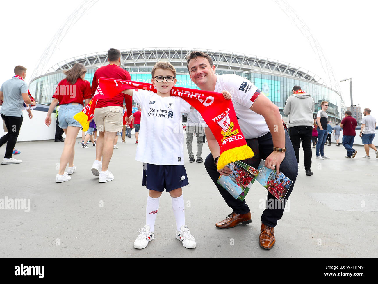 Liverpool fans Gabriel Kenny (left) and Ryan Kenny show their support ...