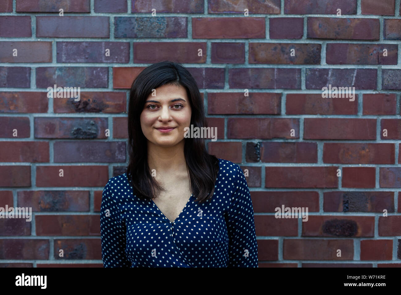 Gently smiling hi-res stock photography and images - Alamy