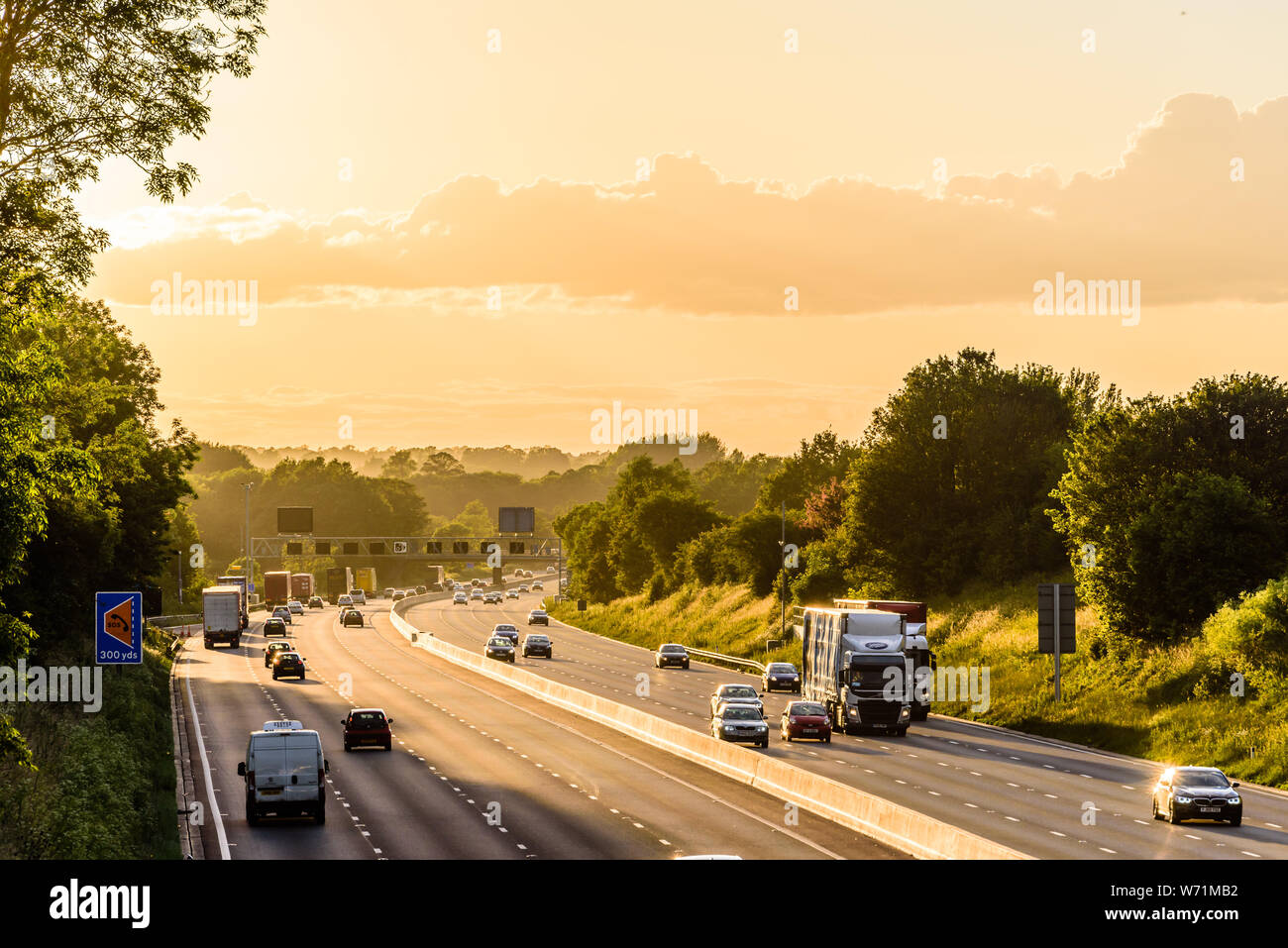 busy traffic on uk motorway road overhead view at sunset Stock Photo ...