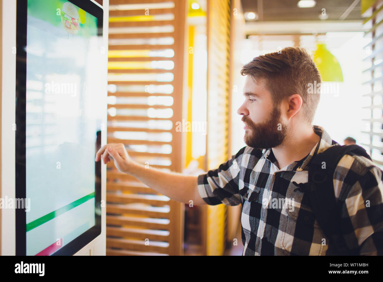 Hand electronic menu tablet hi-res stock photography and images - Alamy